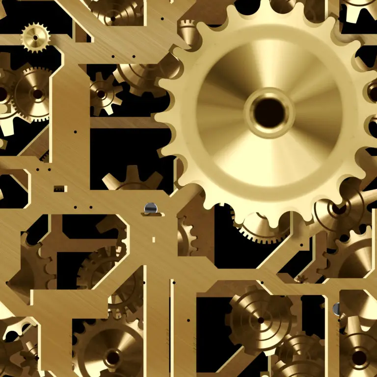 Gold texture of cogs and gears on metal plate