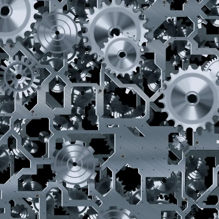 Gold texture of cogs and gears on metal plate